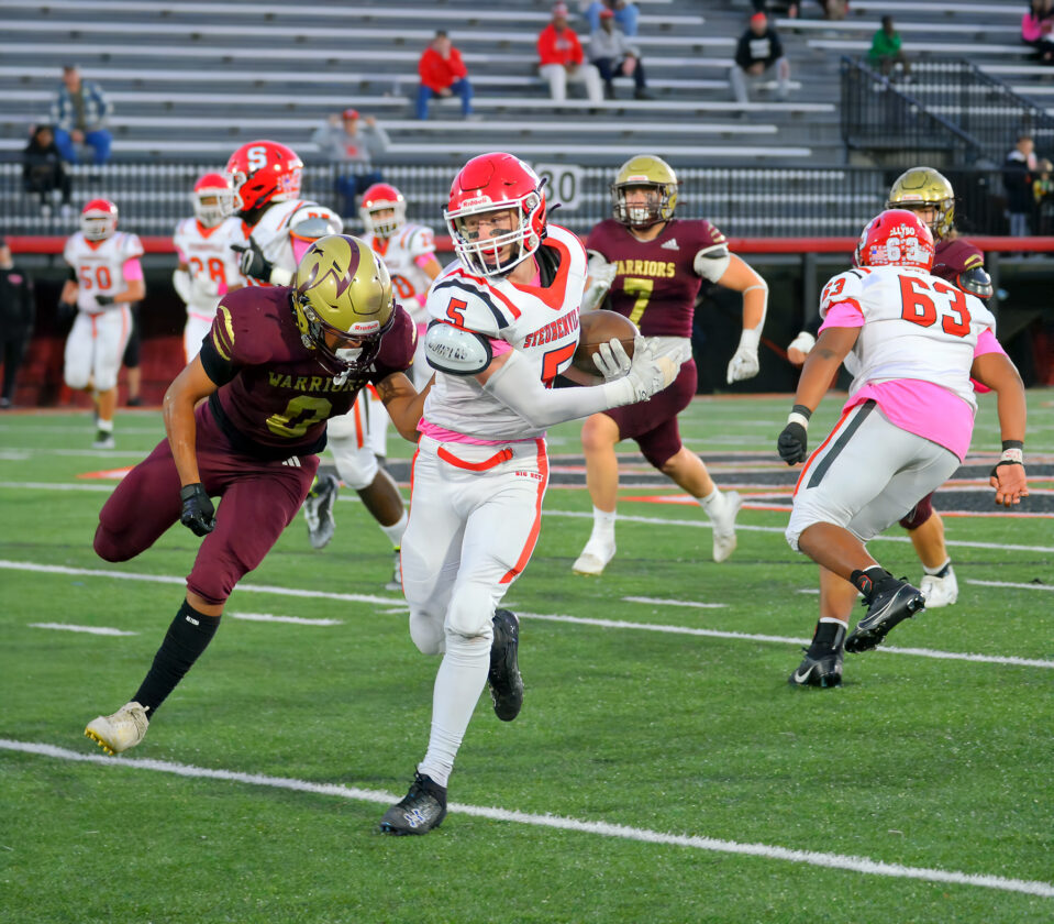 Big Red adapts, fends off Huron Heights to remain undefeated | News ...